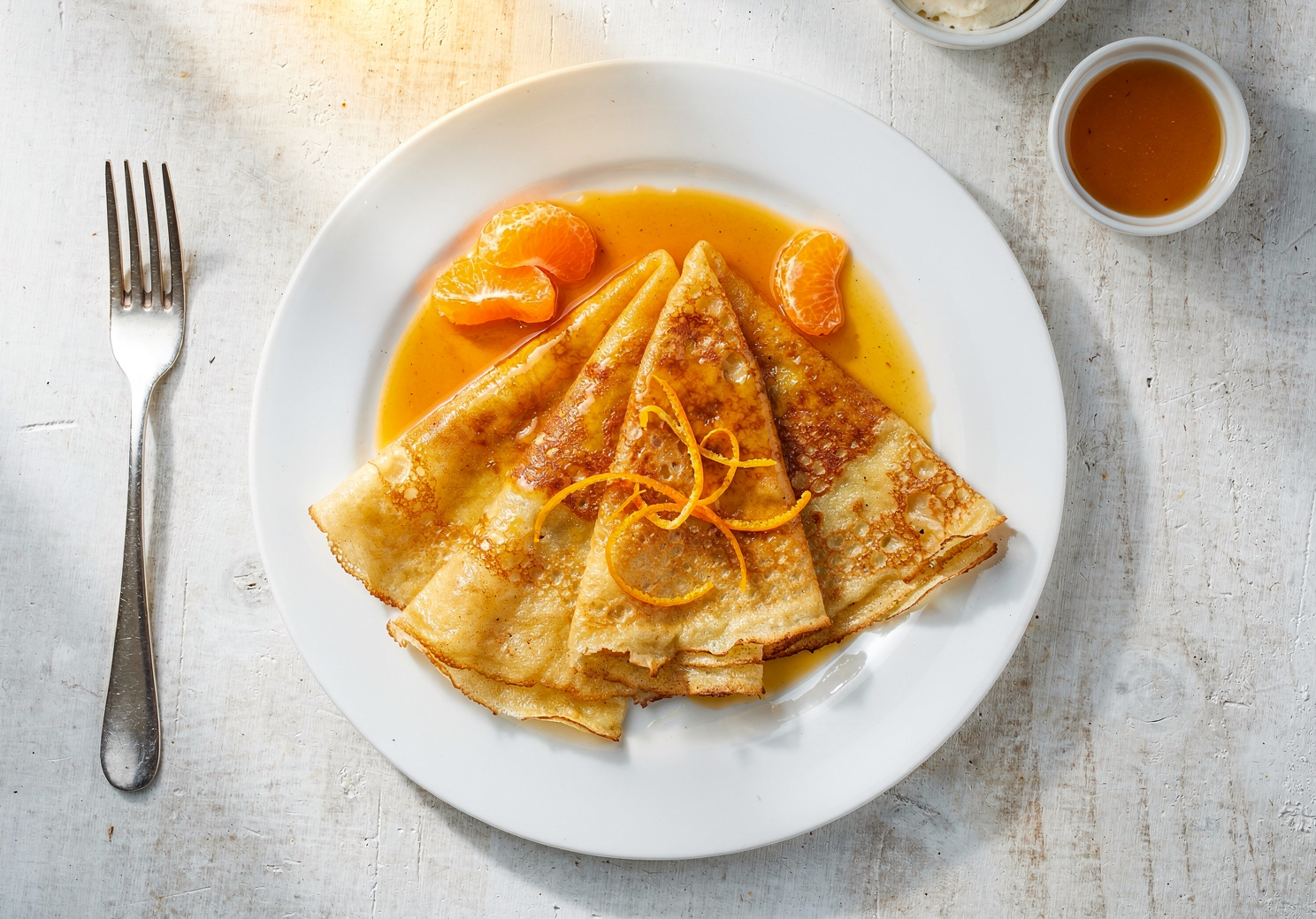 Crepe Suzette Recipe: A Flambe Showstopper for Any Night - GourmetPair